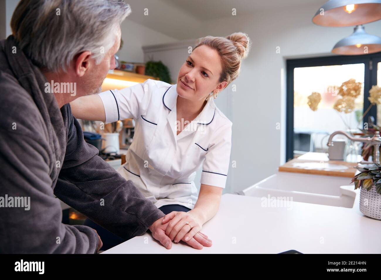 African male female uniform talking hi-res stock photography and images ...