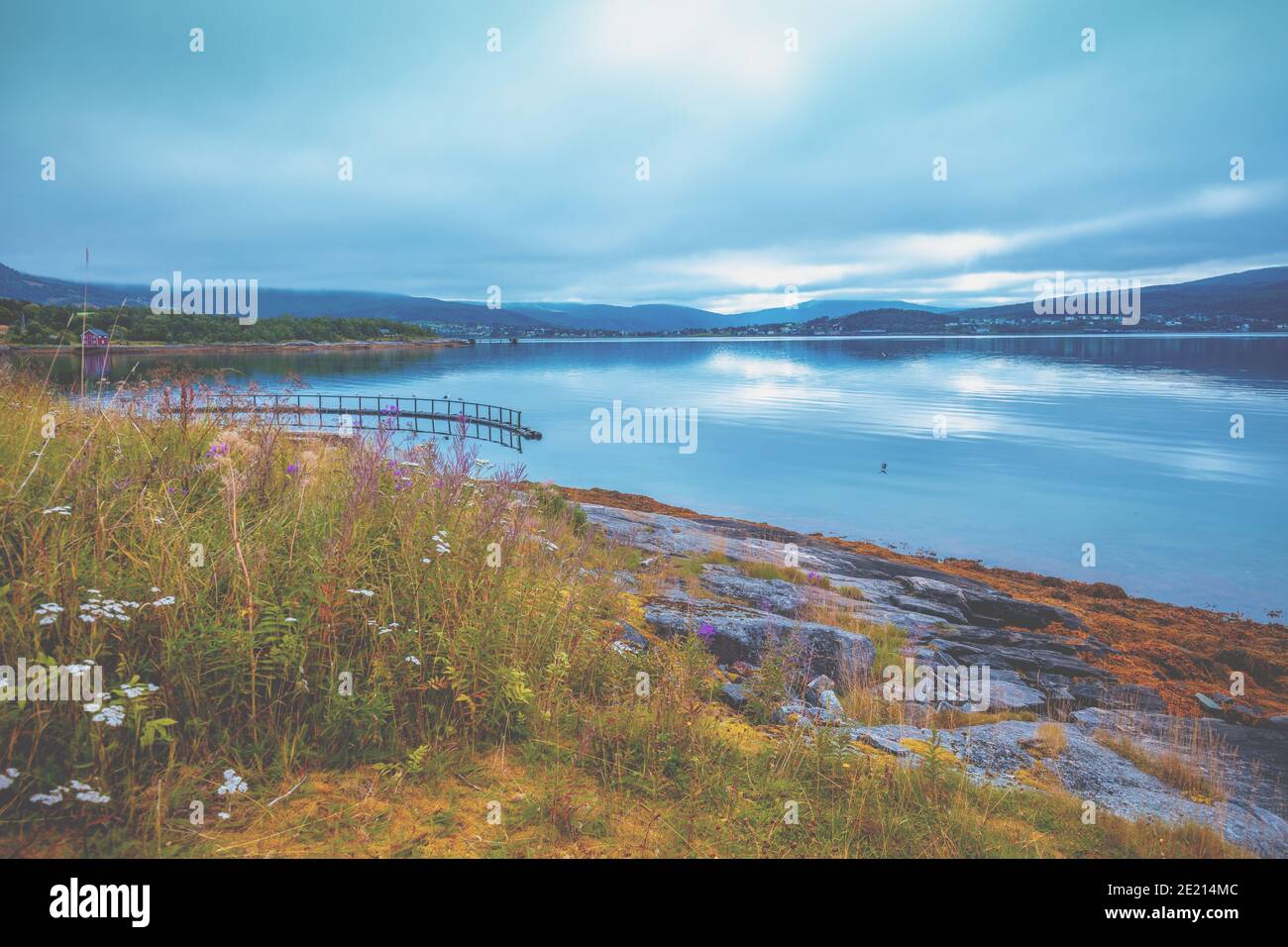 View of the fjord. Rocky sea shore with cloudy sky. Beautiful nature of ...