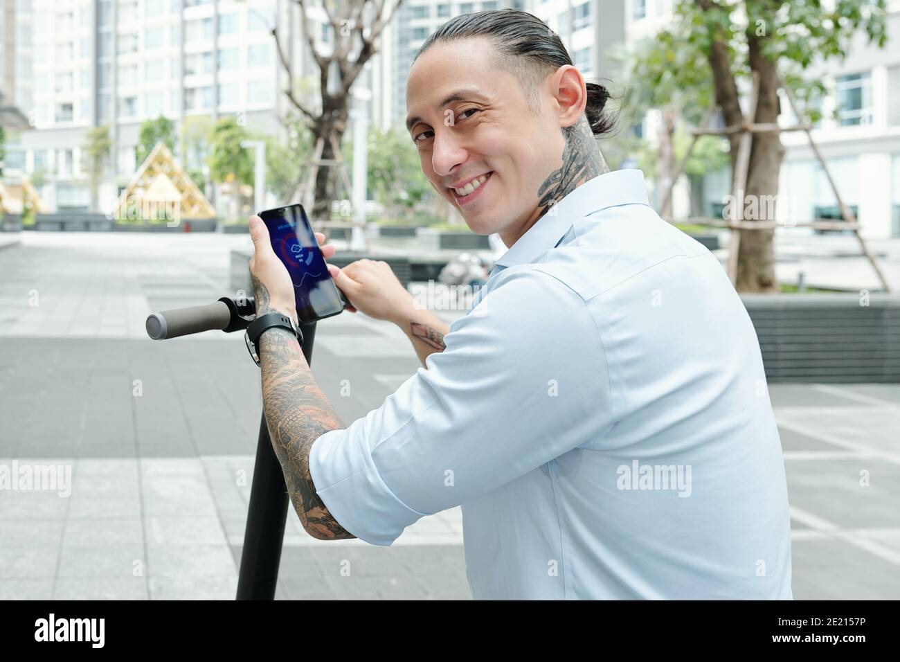 Man checking weather report Stock Photo - Alamy