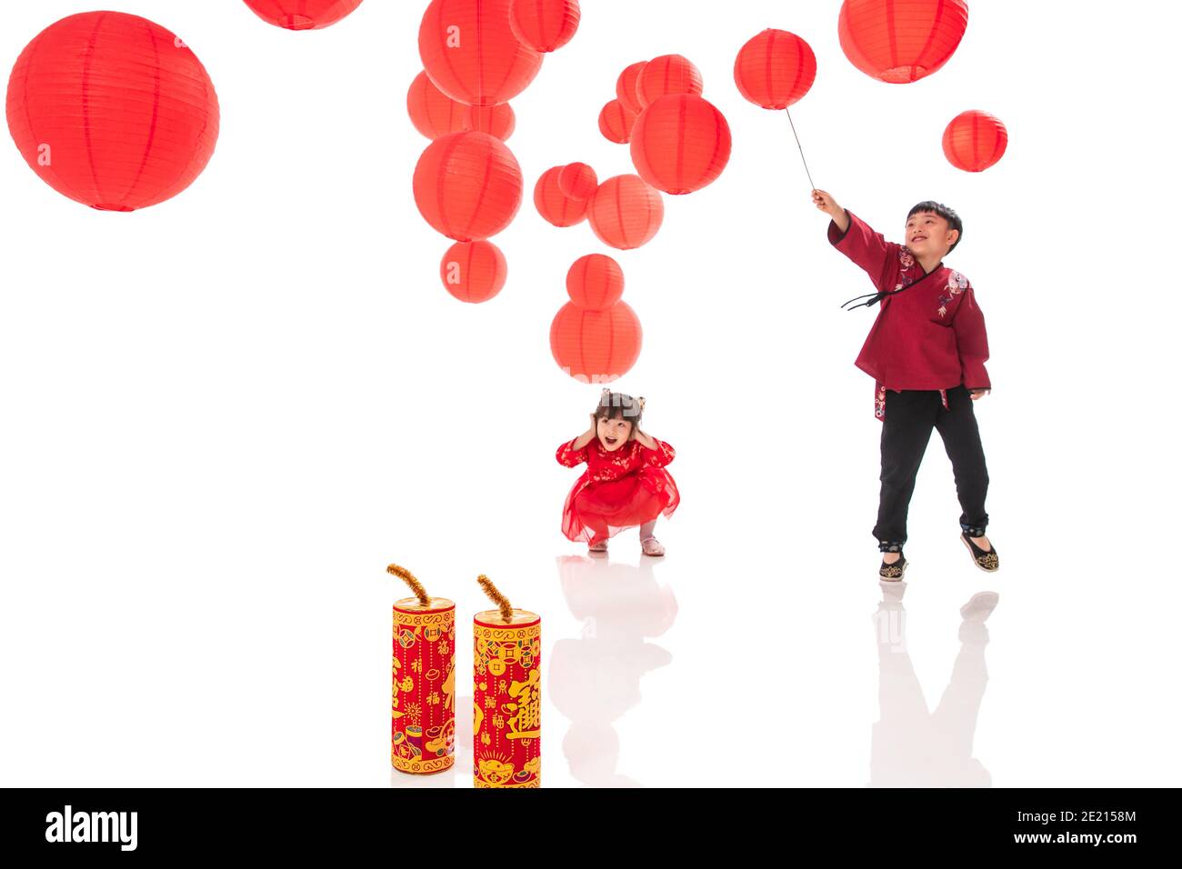 The joy of New Year's eve firecrackers boys and girls Stock Photo - Alamy