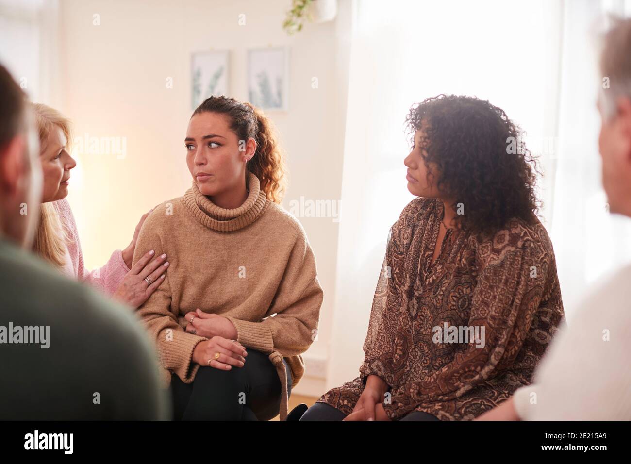 Consoling woman hi-res stock photography and images - Alamy