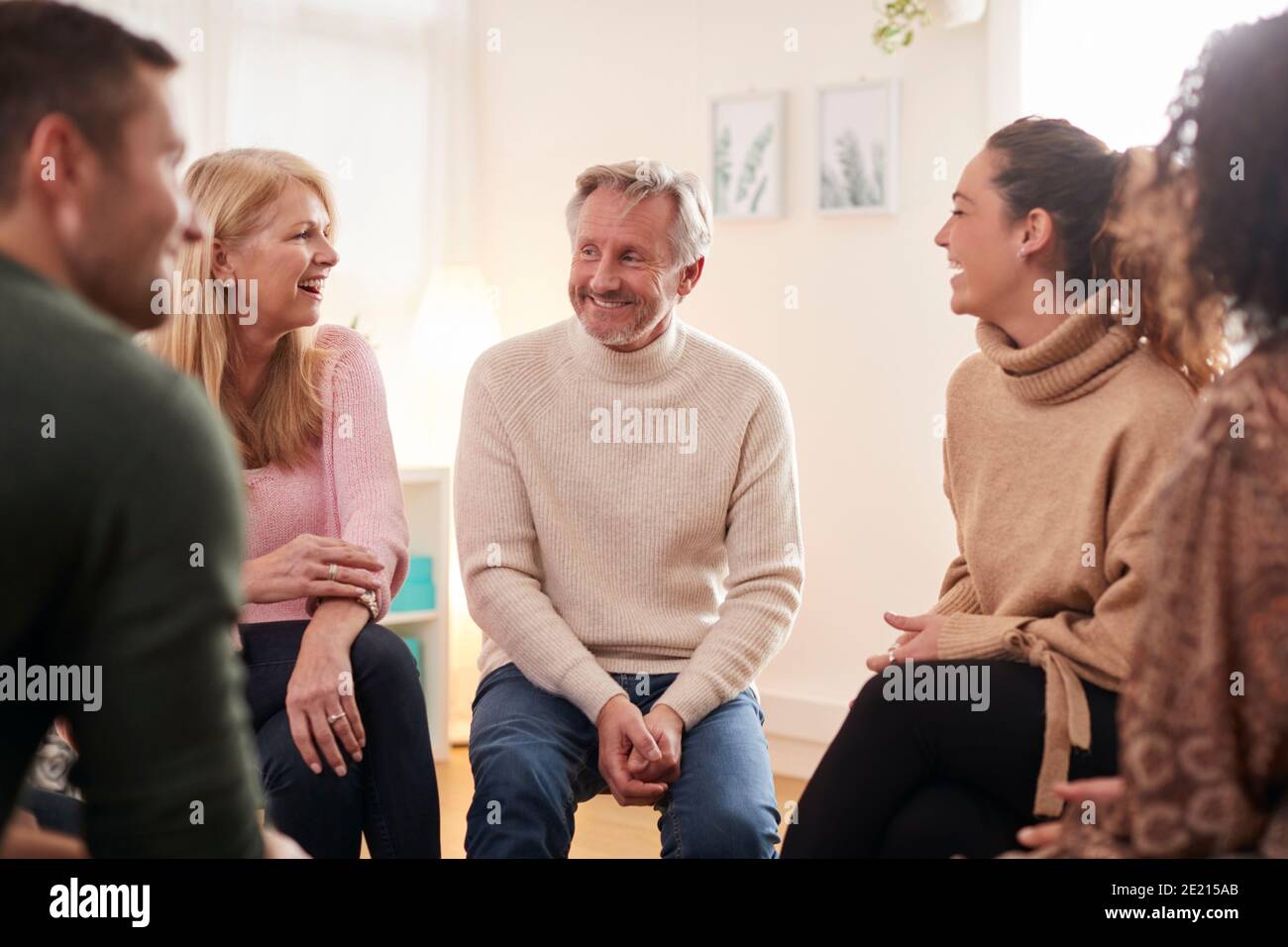 Man Speaking At Support Group Meeting For Mental Health Or Dependency ...