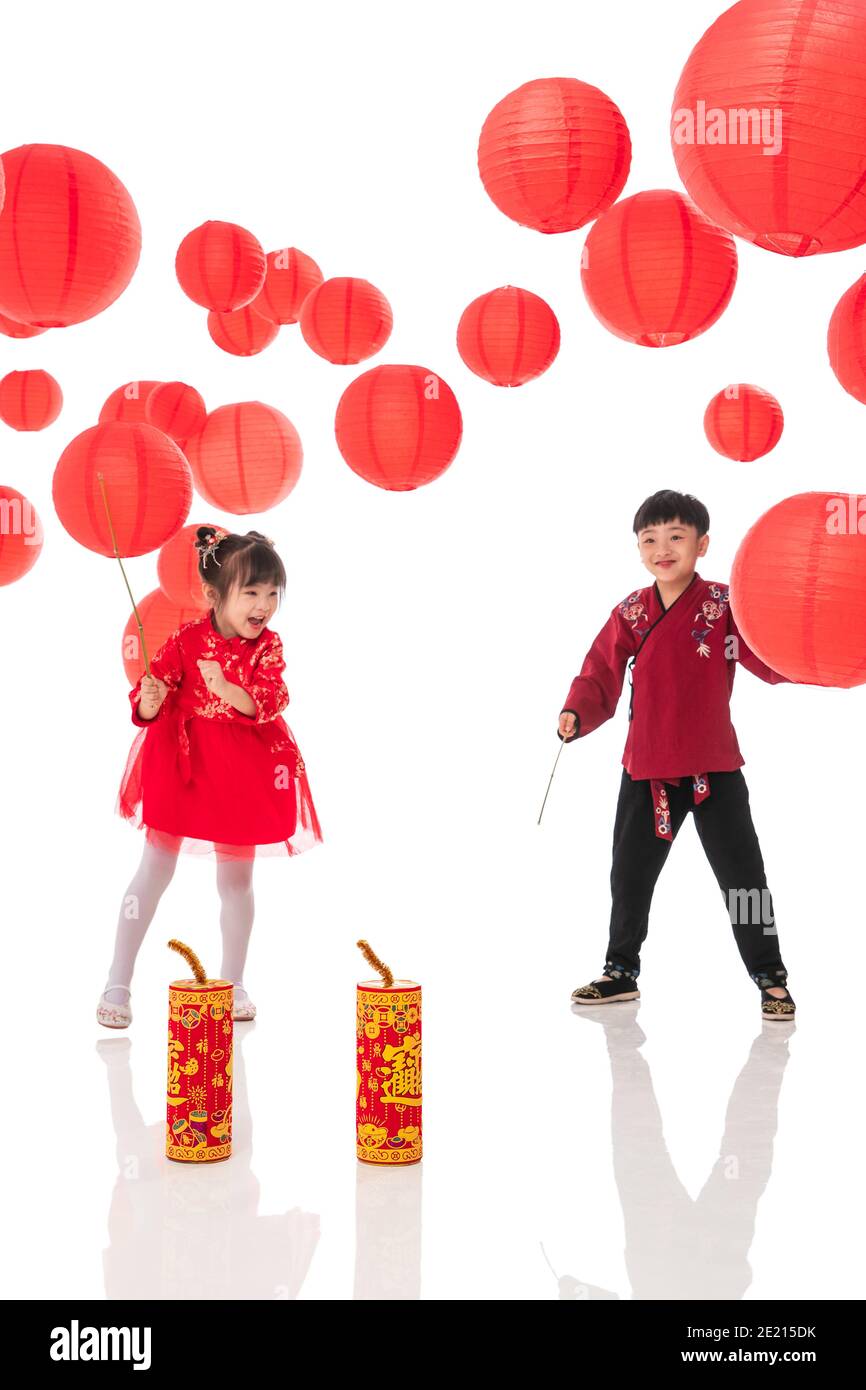 The joy of New Year's eve firecrackers boys and girls Stock Photo - Alamy
