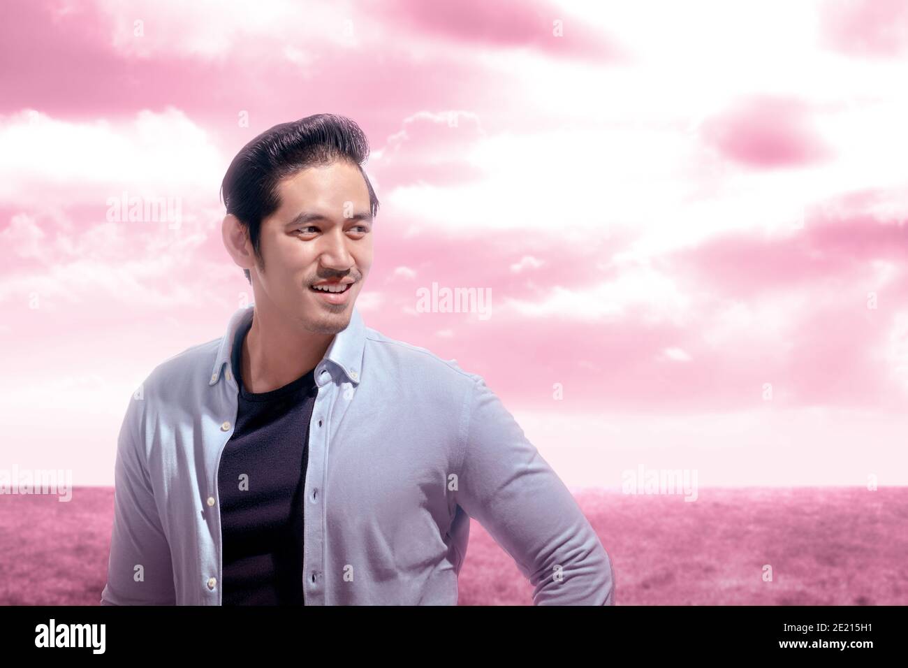 Asian man standing dramatic hi-res stock photography and images - Alamy