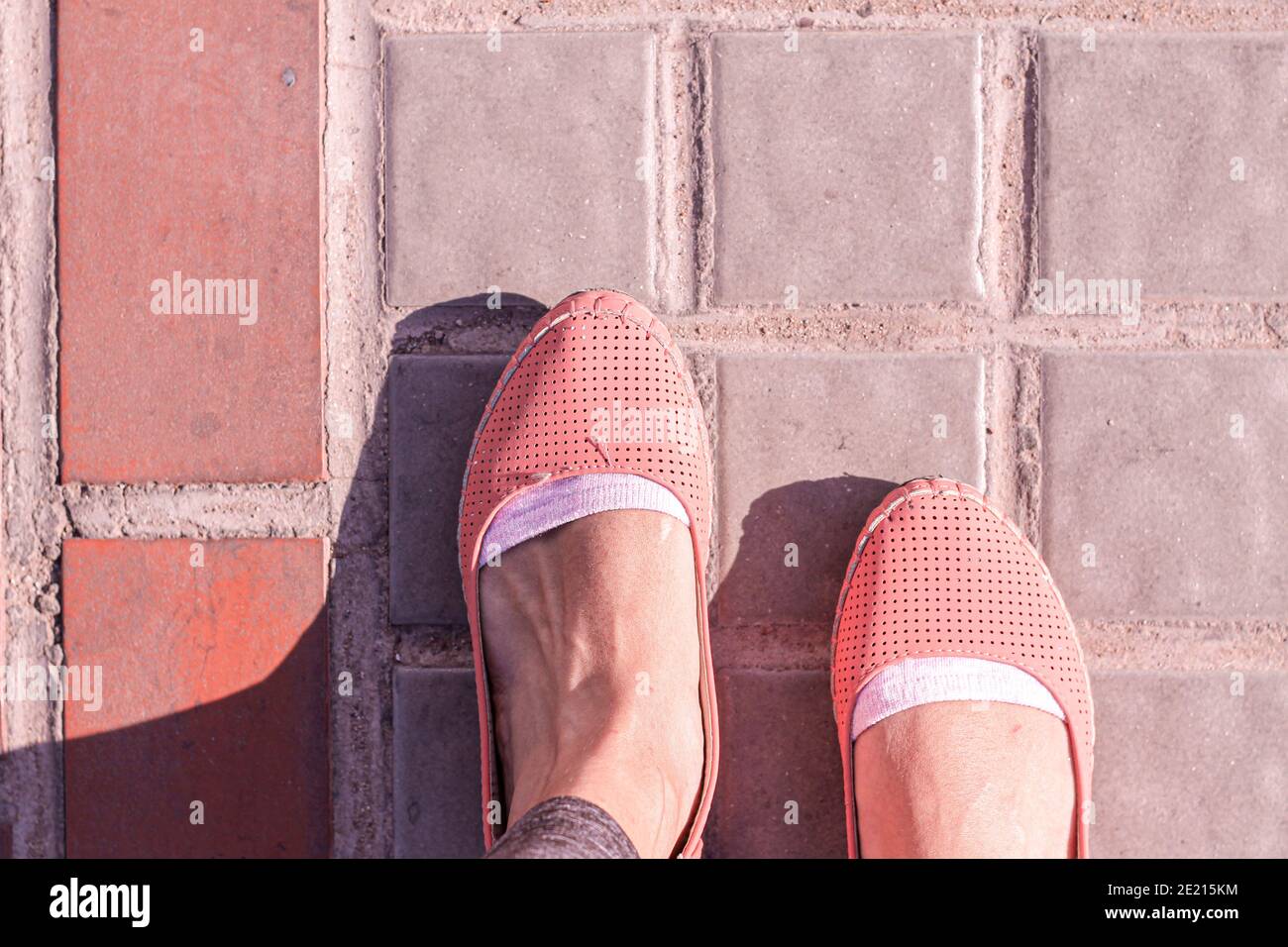 Feet on pavement overhead hi-res stock photography and images - Alamy