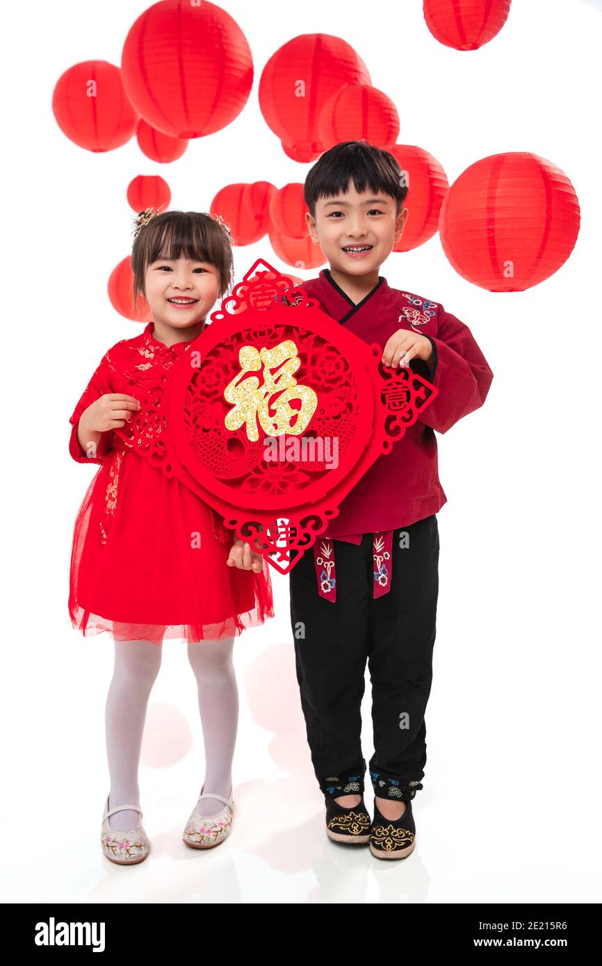 Happy boys and girls to celebrate the New Year Stock Photo - Alamy