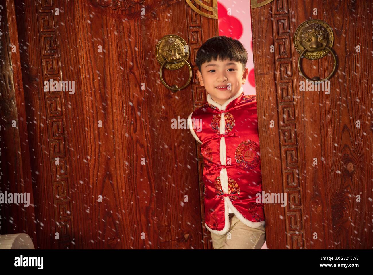 Celebrate the New Year happy little boy Stock Photo - Alamy