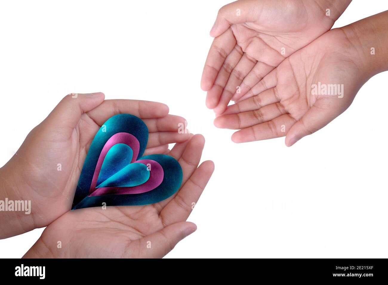 Human hand giving a colorful heart isolated over white background Stock ...