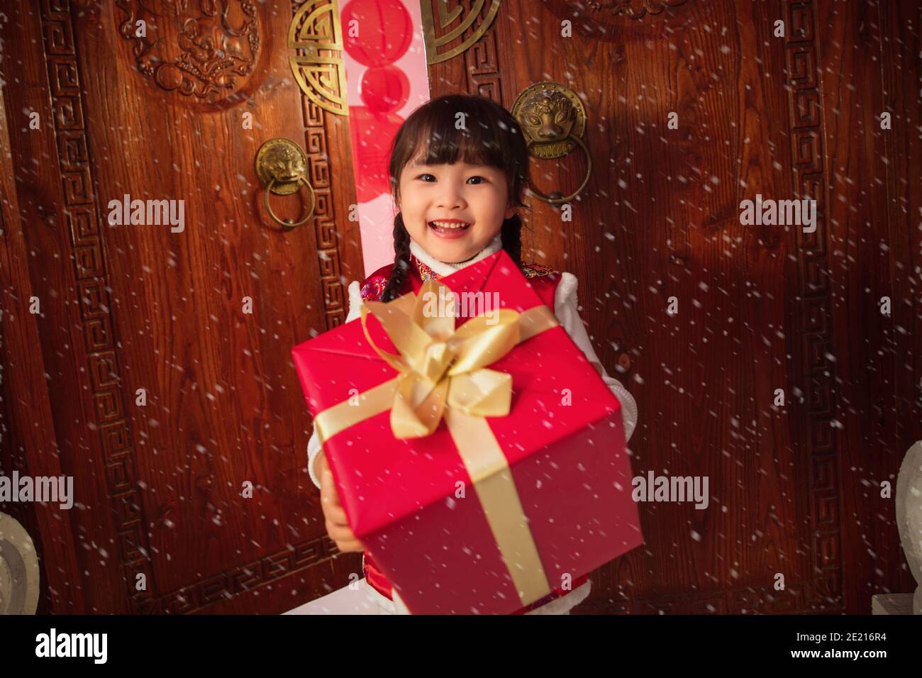 Cute girl with gift box Stock Photo - Alamy