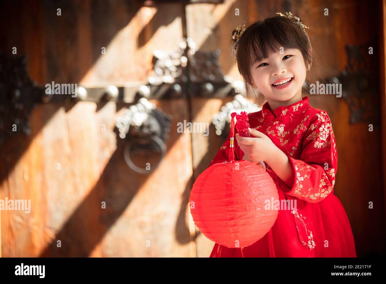 Cute girl with red lanterns Stock Photo - Alamy