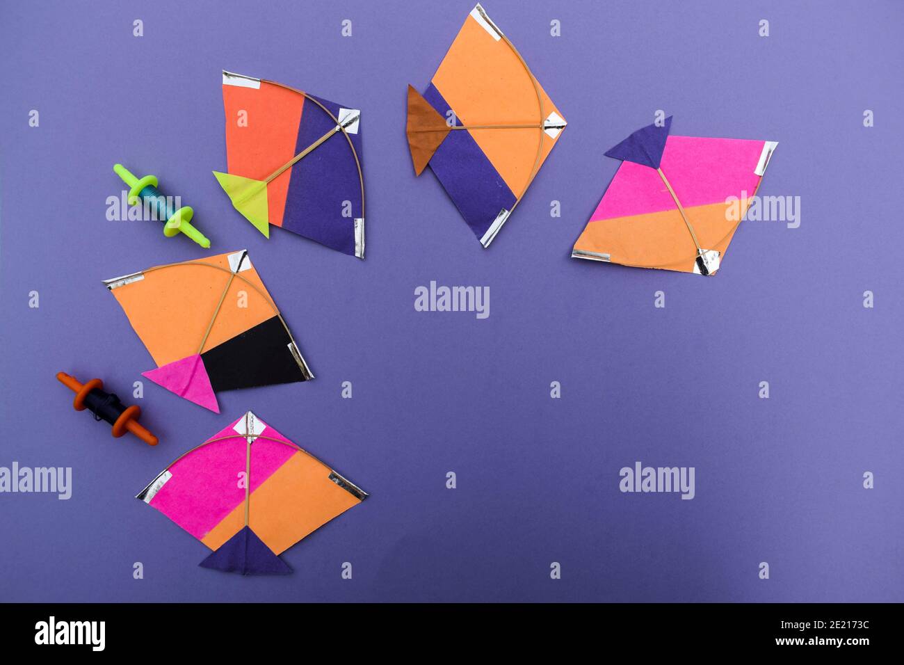 Miniature tiny kites with small spool of thread rolls, Patang with ...