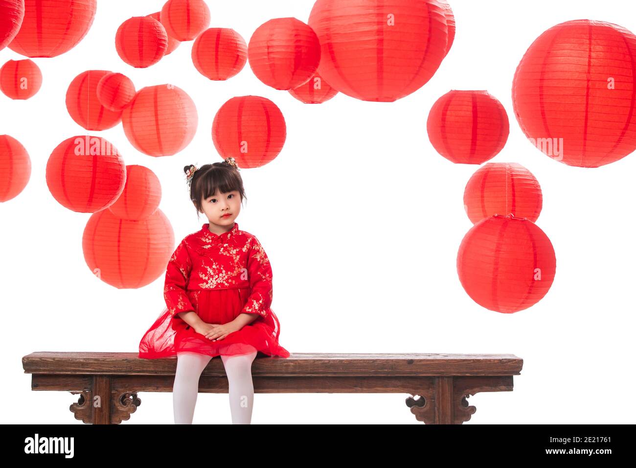 The pretty little girl under the red lanterns Stock Photo - Alamy