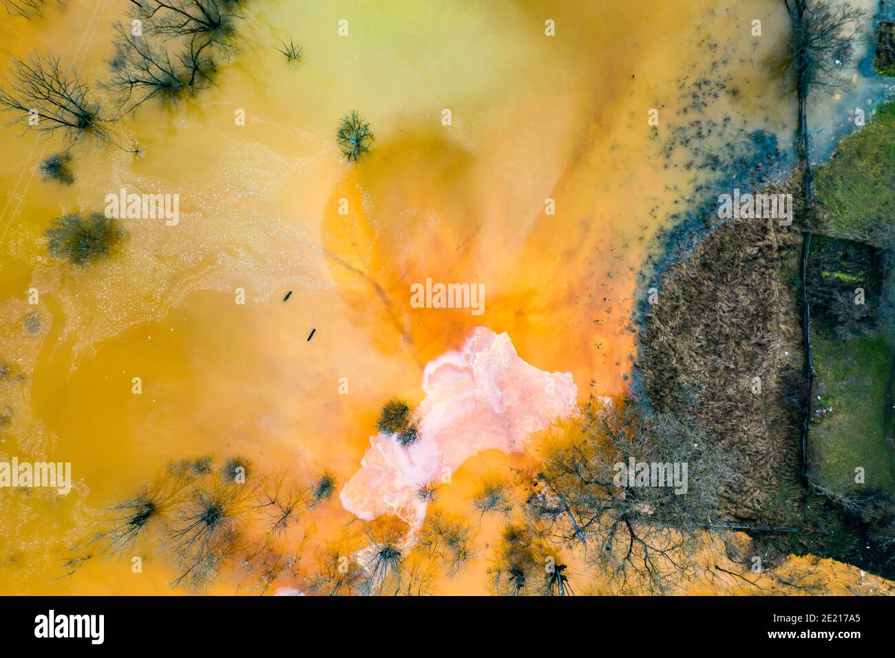 Aerial drone view of water pollution of a copper mine exploitation ...