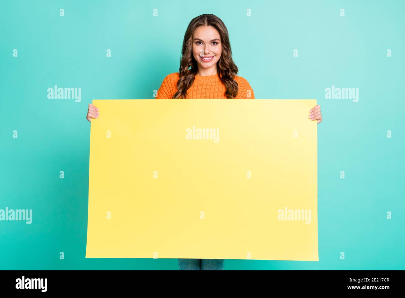 Photo of young attractive girl happy positive smile hold poster ...