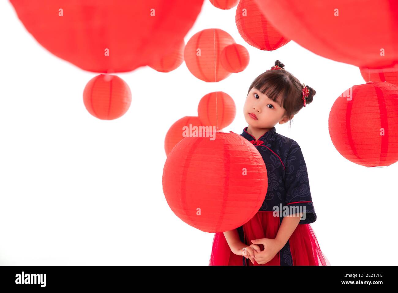 Beautiful little girl and red lanterns Stock Photo - Alamy
