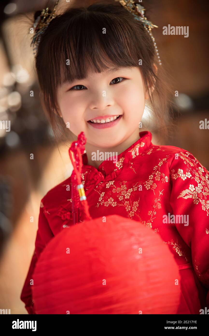 Cute girl with red lanterns Stock Photo - Alamy