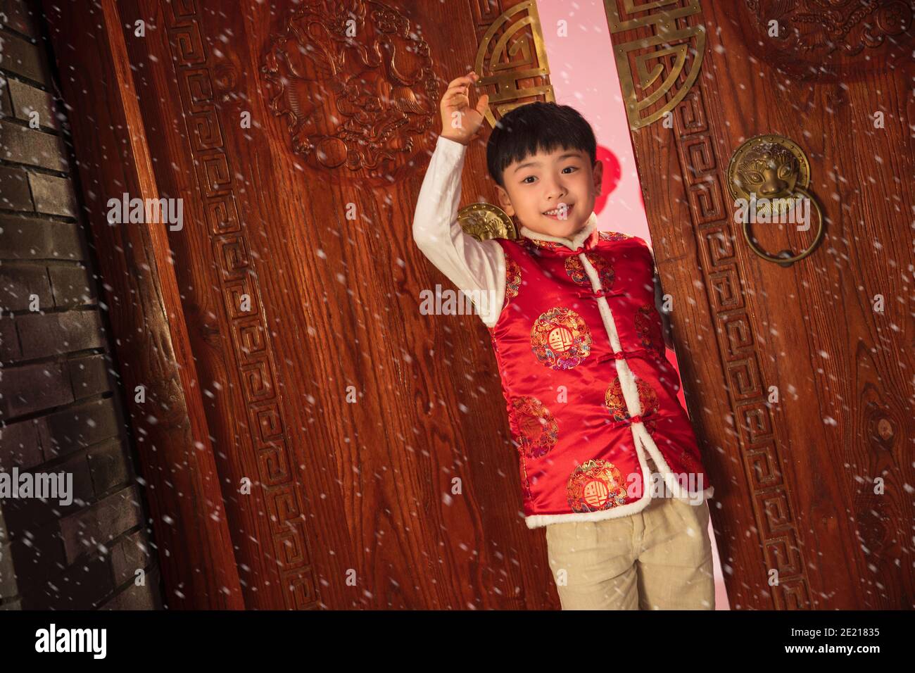 Celebrate the New Year happy little boy Stock Photo - Alamy