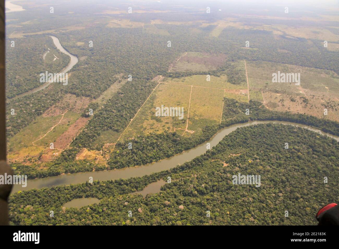Aerial view of the Brazilian Amazonian Rain Forest showing areas of ...