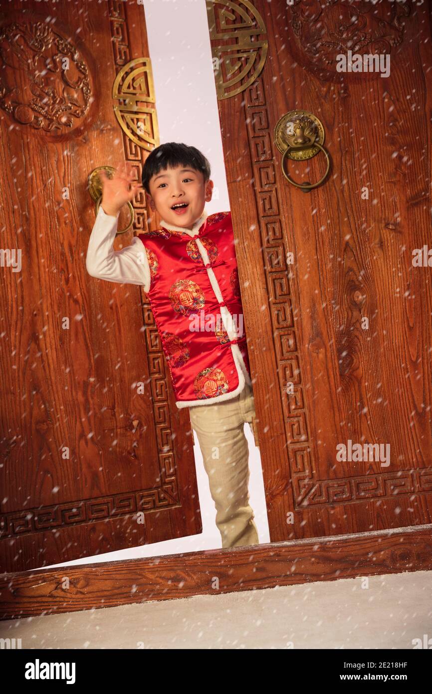 Celebrate the New Year happy little boy Stock Photo - Alamy