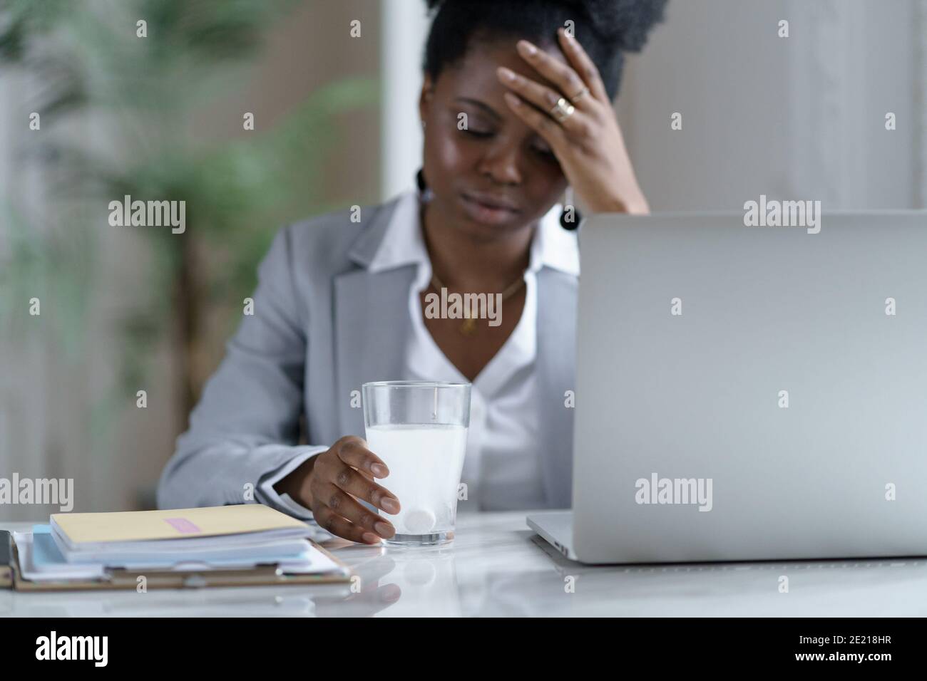 Sick afro unhealthy business woman feeling first grippe illness ...