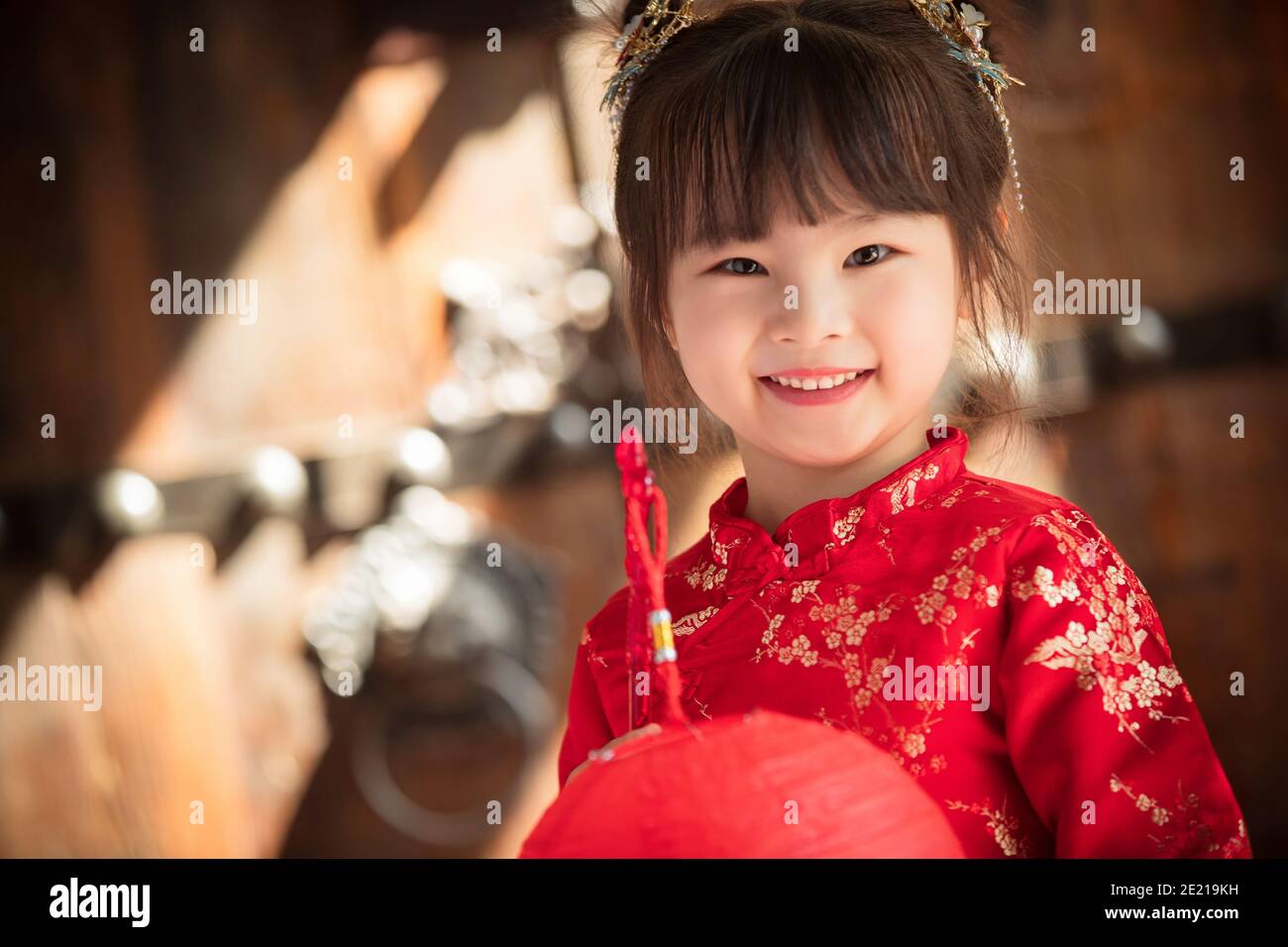 Cute girl with red lanterns Stock Photo - Alamy