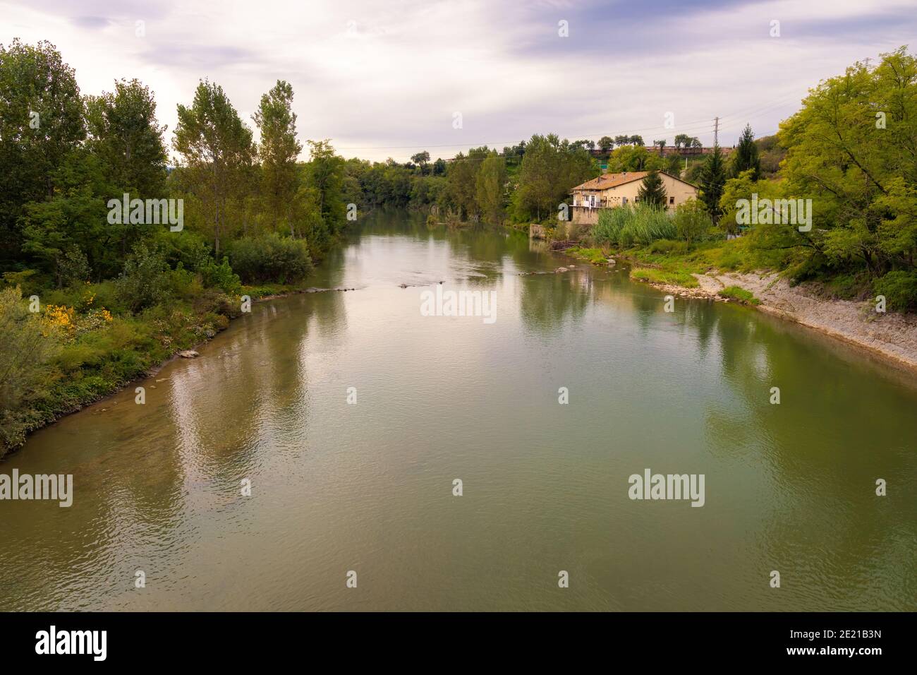 View of the river Ter as it passes through Sant Hipolito de Voltrega ...