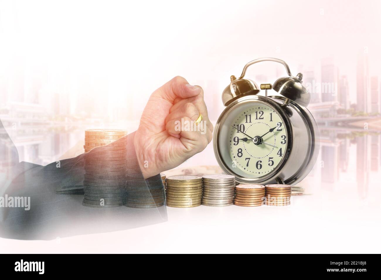 Double exposure of hand of business fist with a row of stack money ...
