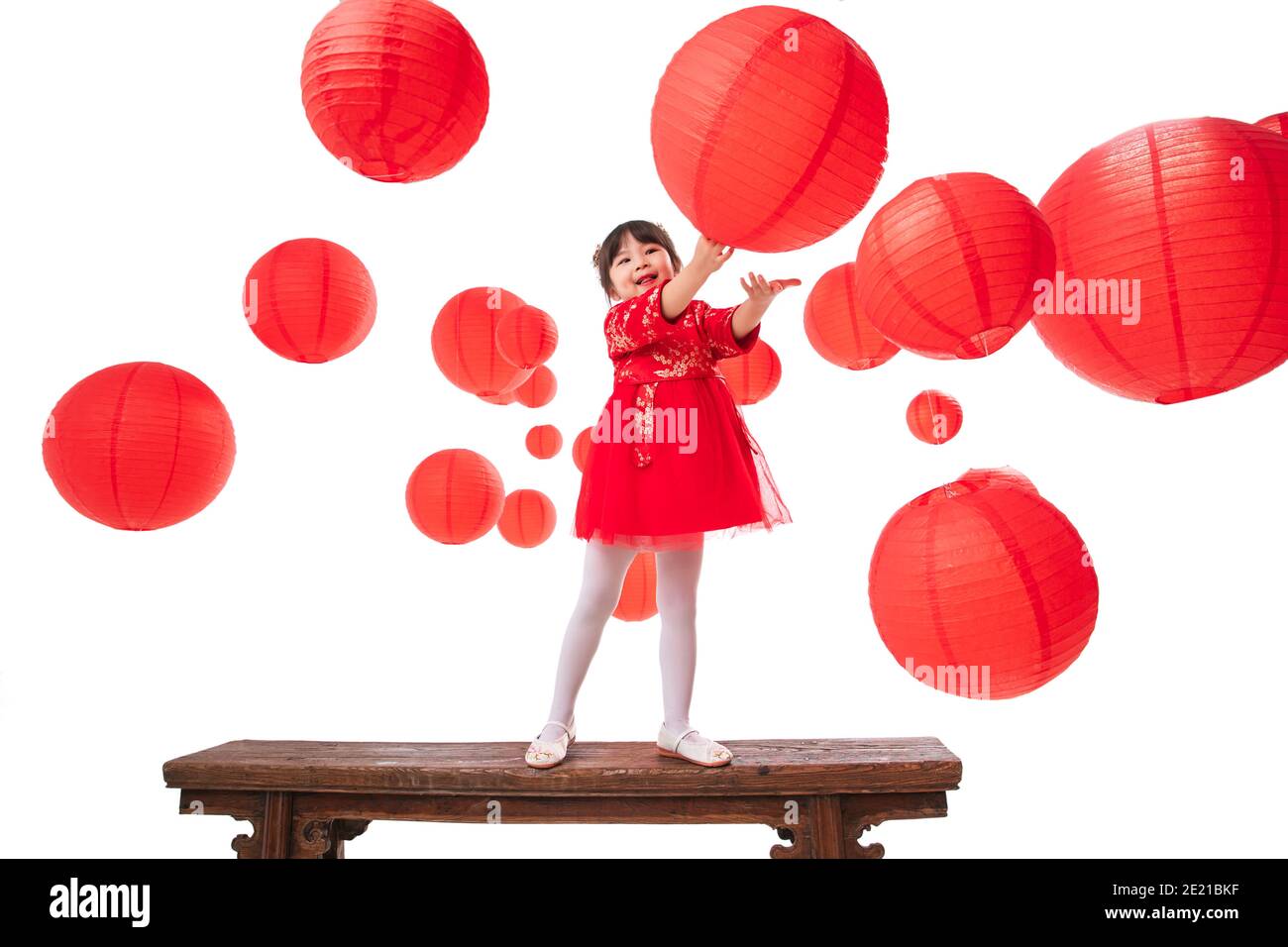Red lanterns and play around the little girl Stock Photo - Alamy