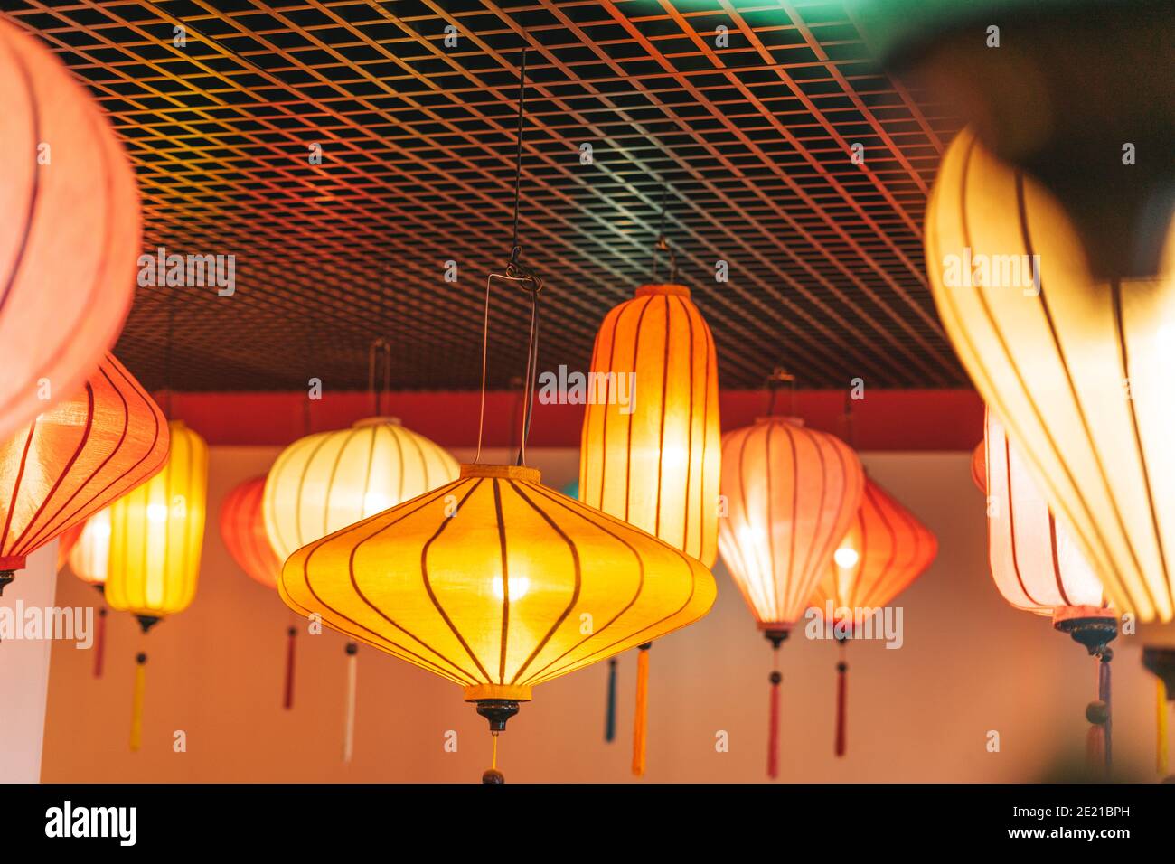 Colorful Chinese lanterns lamps on the ceiling textured background ...