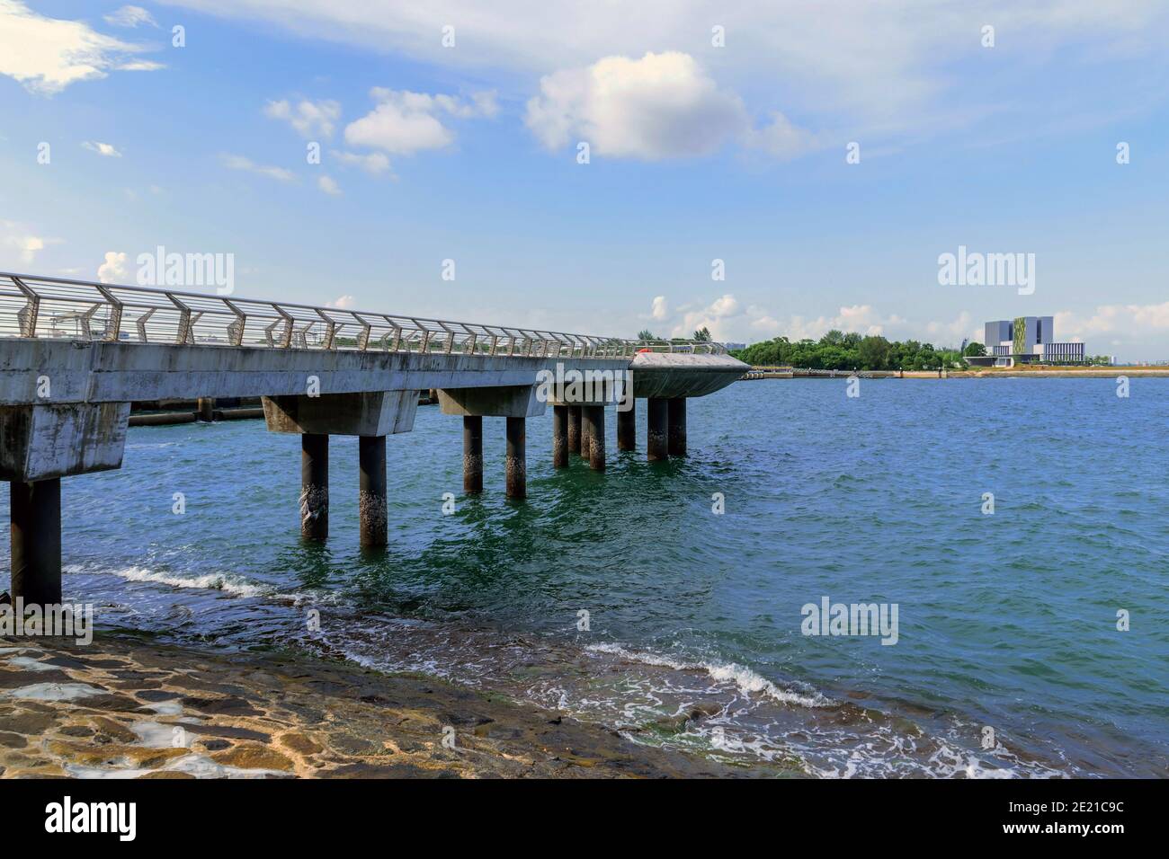 Concrete bridge pier extending into the sea Stock Photo - Alamy