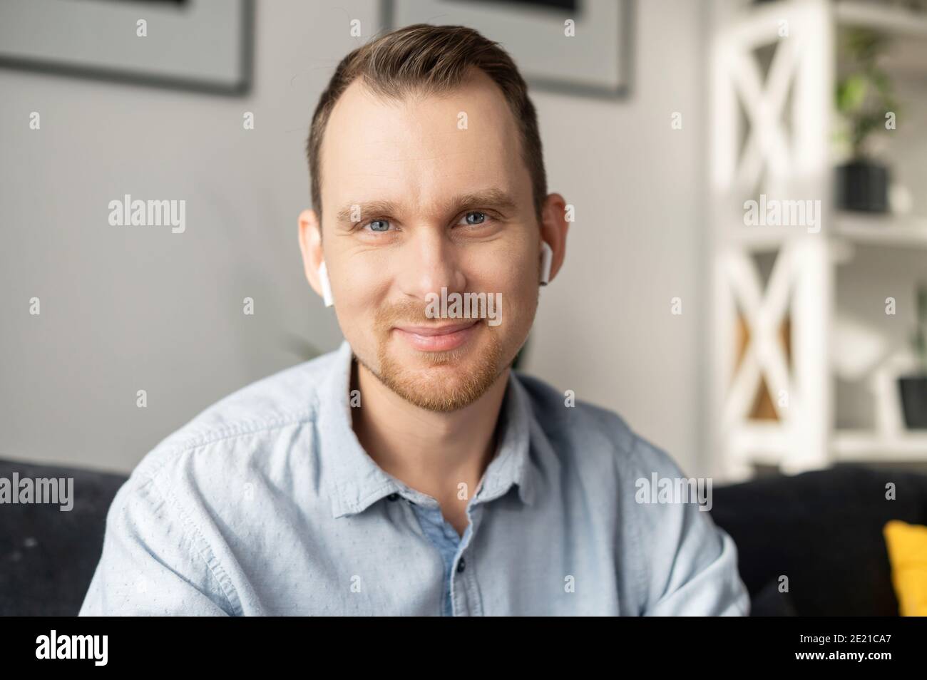 A video call with a happy guy Stock Photo - Alamy