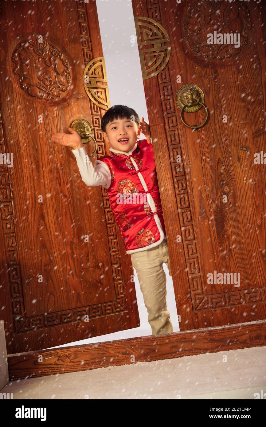 Celebrate the New Year happy little boy Stock Photo - Alamy