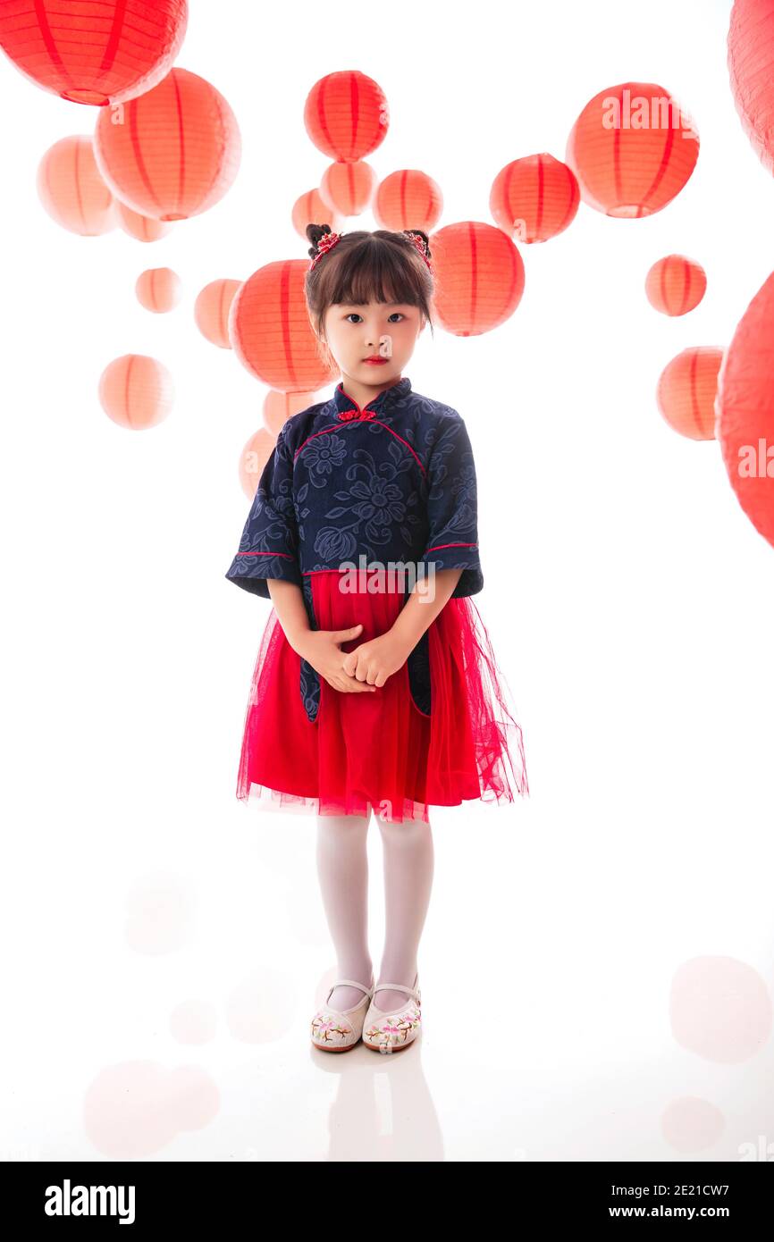 The pretty little girl under the red lanterns Stock Photo - Alamy