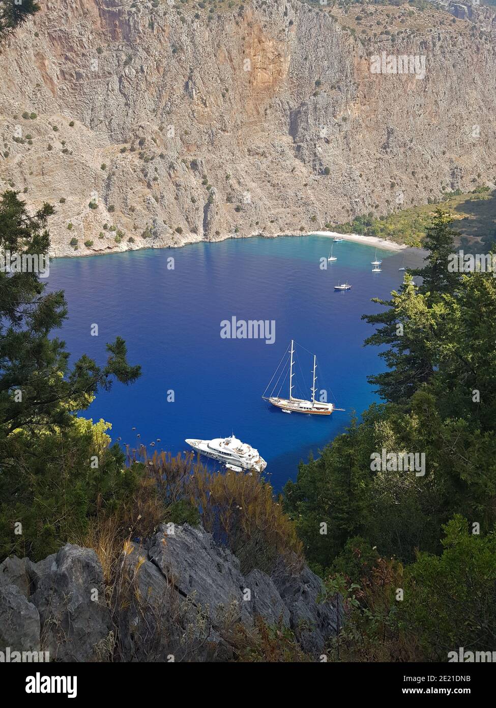 Butterfly Valley over view. White yachts sail in blue sea Stock Photo ...