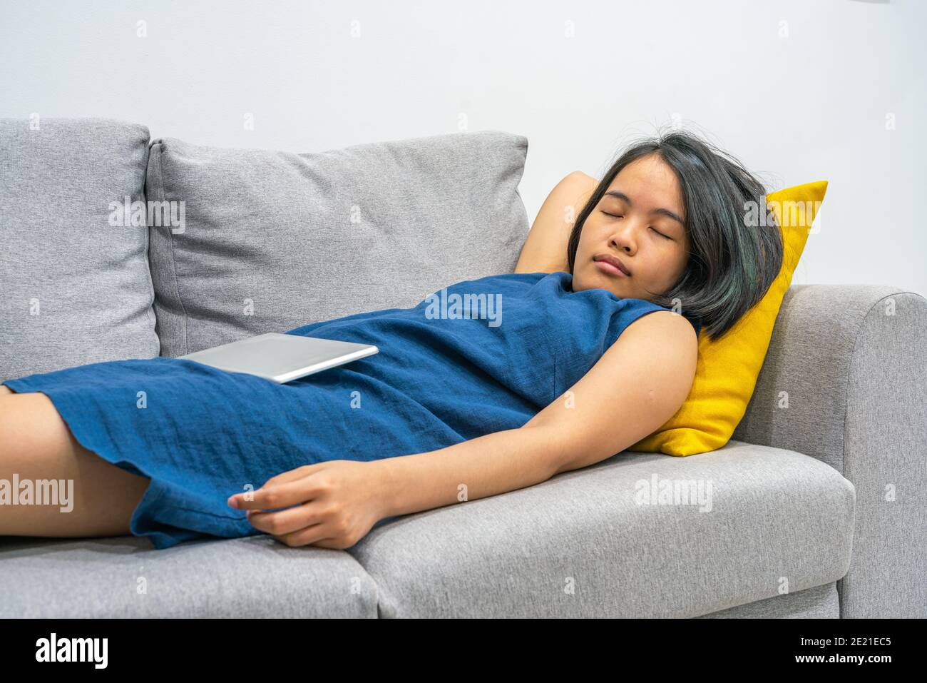 Woman fall asleep sofa hi-res stock photography and images - Alamy