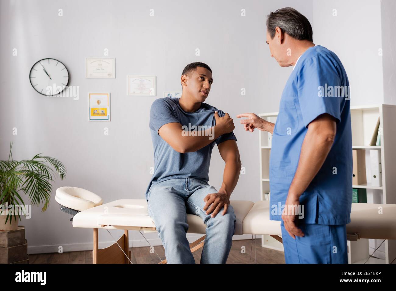 Doctor pointing his finger hi-res stock photography and images - Alamy