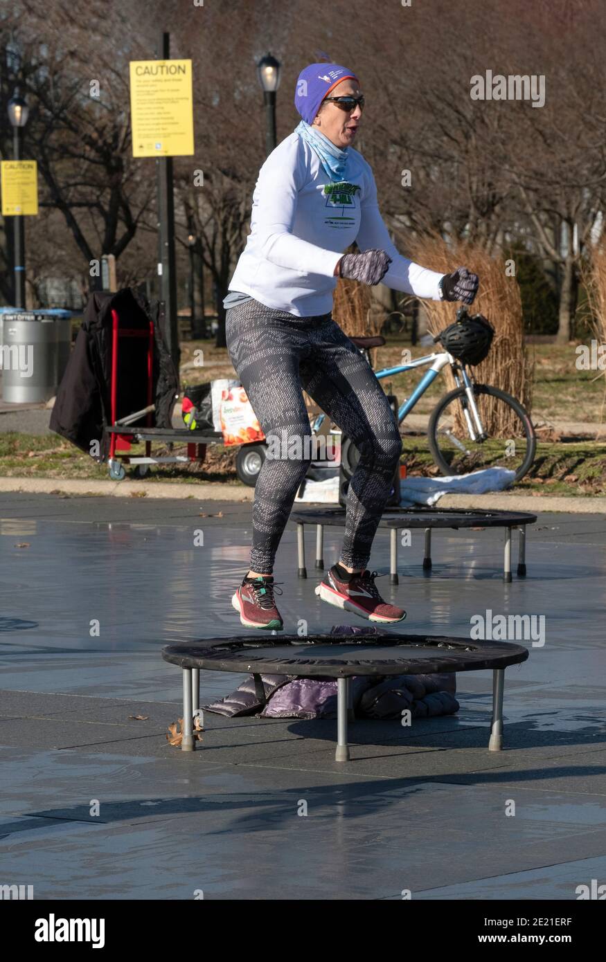 A woman at a rebounding class which combines vigorous movements while ...