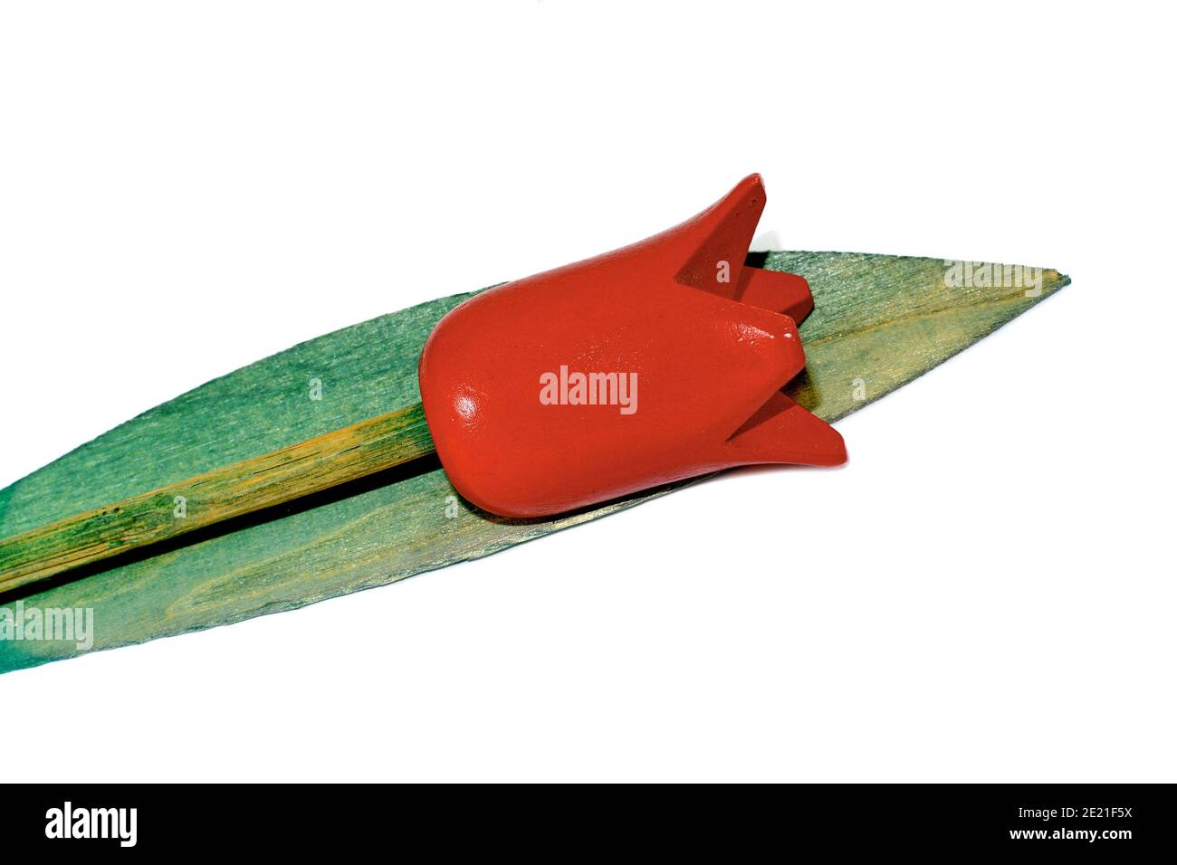 Red Wooden Tulip isolated on white background Stock Photo - Alamy
