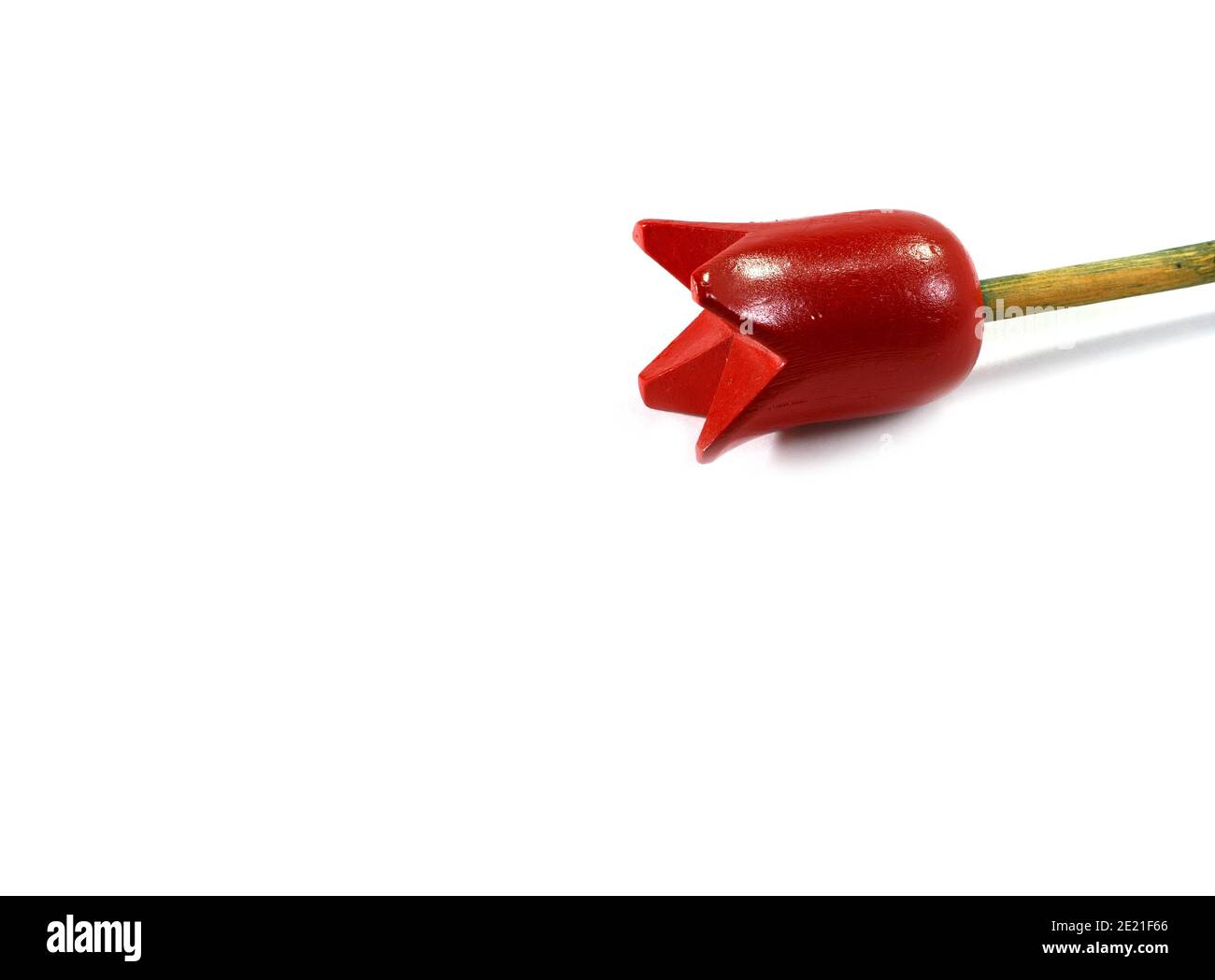 Red Wooden Tulip isolated on white background Stock Photo - Alamy
