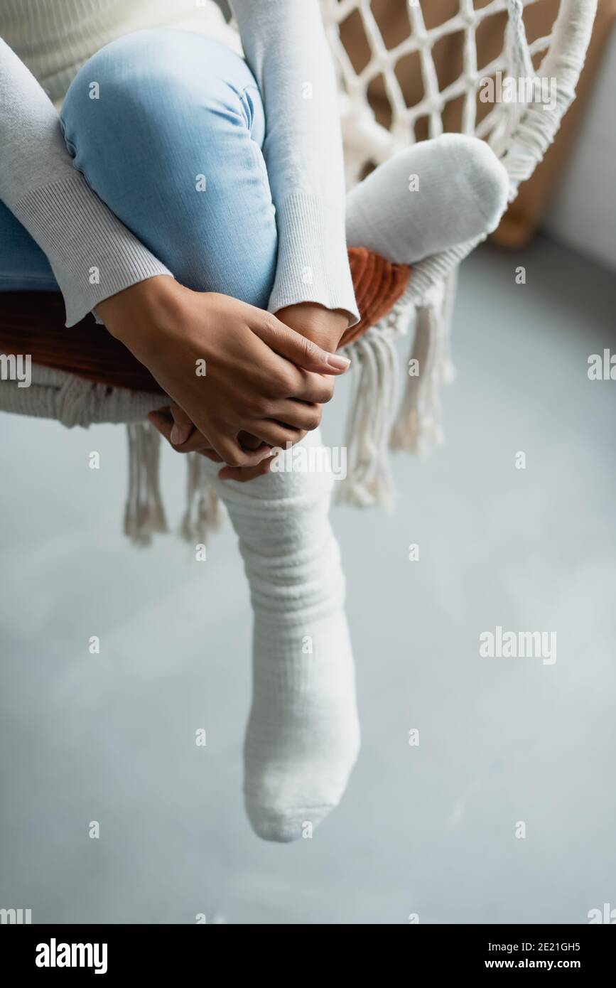 Hanging chair and woman hi-res stock photography and images - Alamy