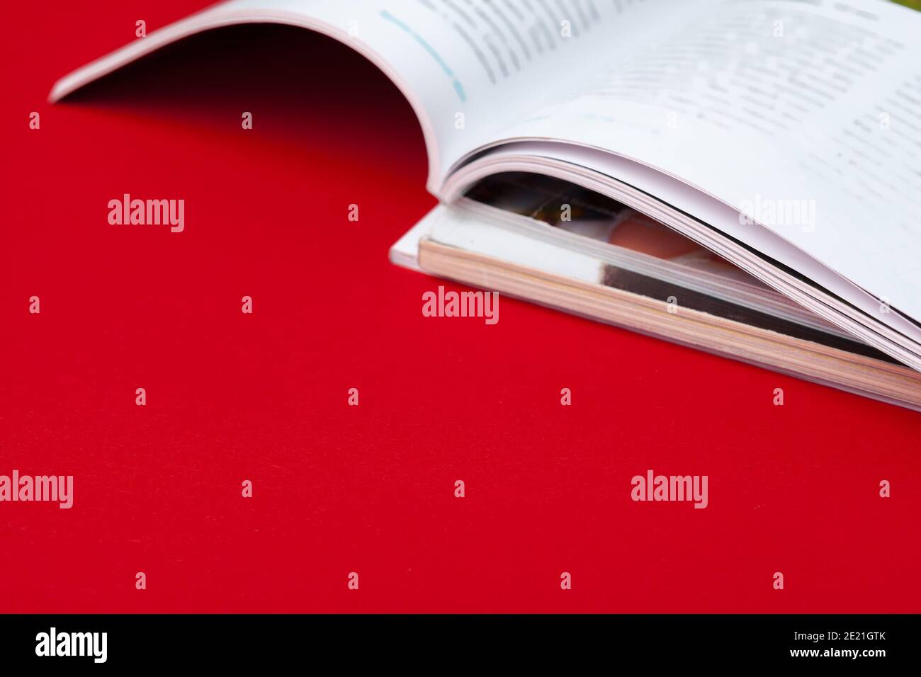 Close up stacking magazine place on table background Stock Photo - Alamy