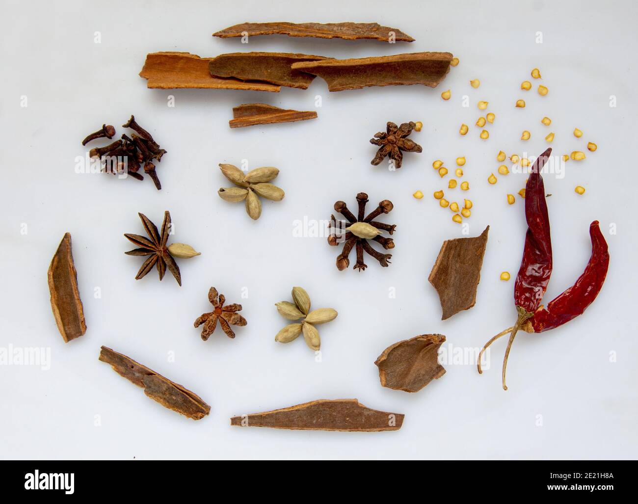 Top view of different spices on a white background Stock Photo - Alamy