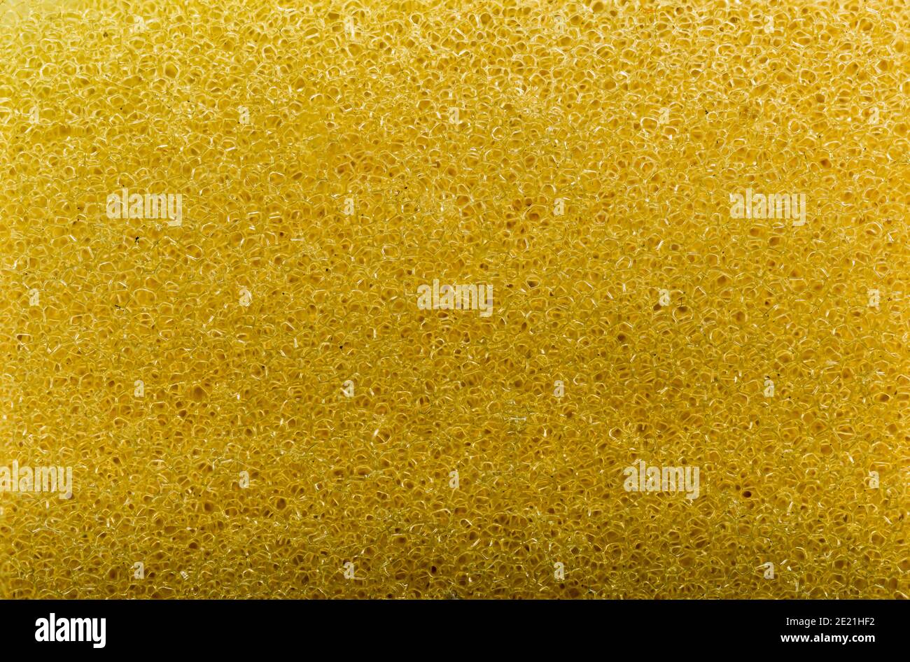 Abstract top view of yellow synthetic fiber texture background. Close ...