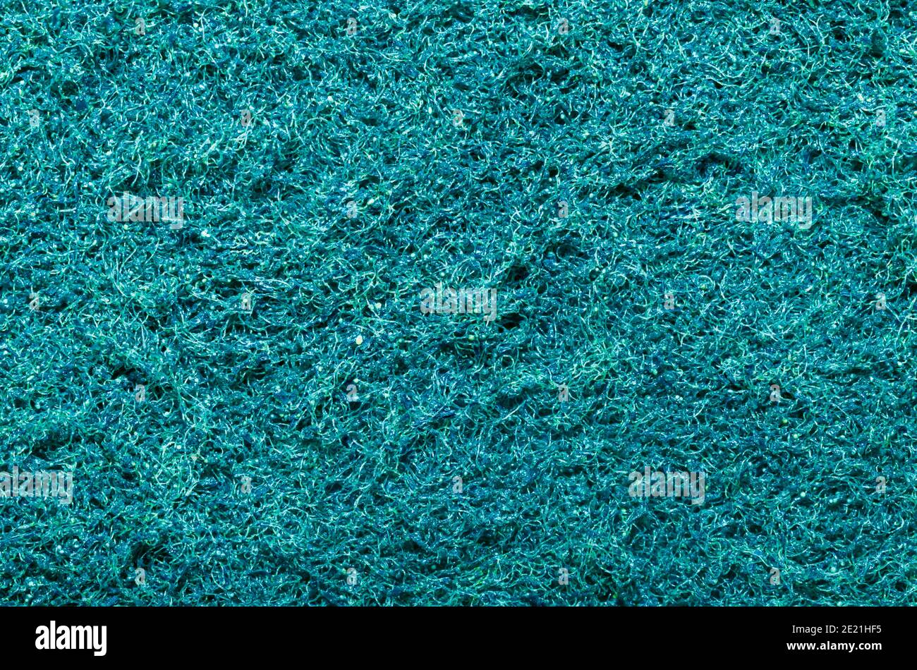 Abstract top view of green synthetic fiber texture background. Close-up ...