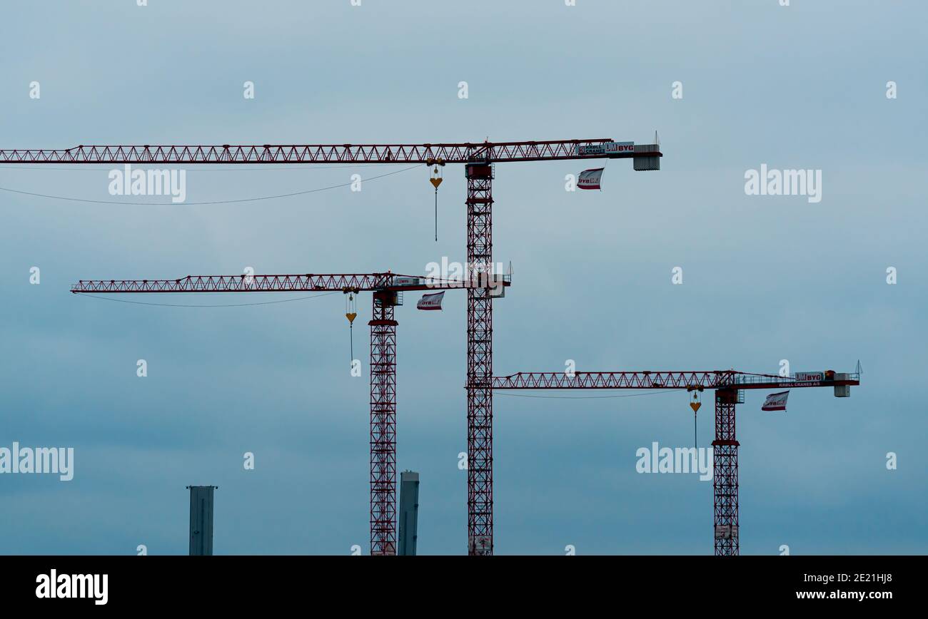 Large construction cranes on site in the port of Copenhagen Stock Photo ...