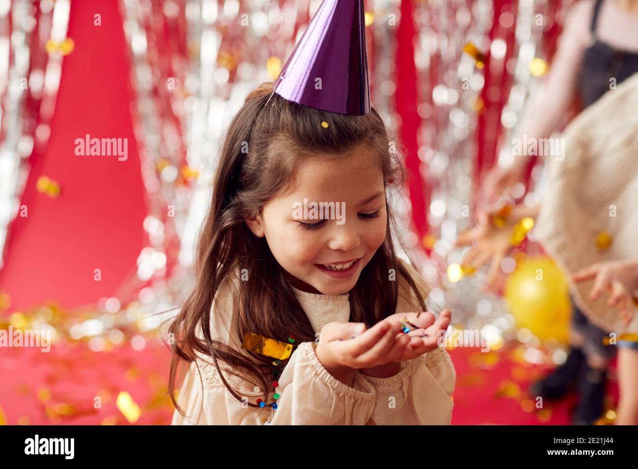 Girl throwing confetti hi-res stock photography and images - Alamy