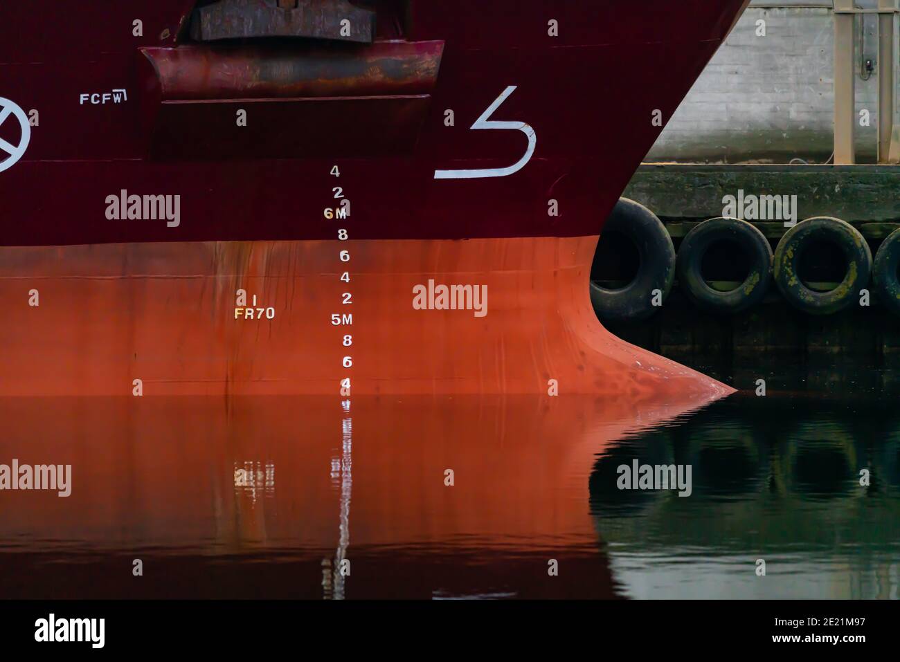 Close up image of the bow and bulb of a large steel cargo ship Stock ...
