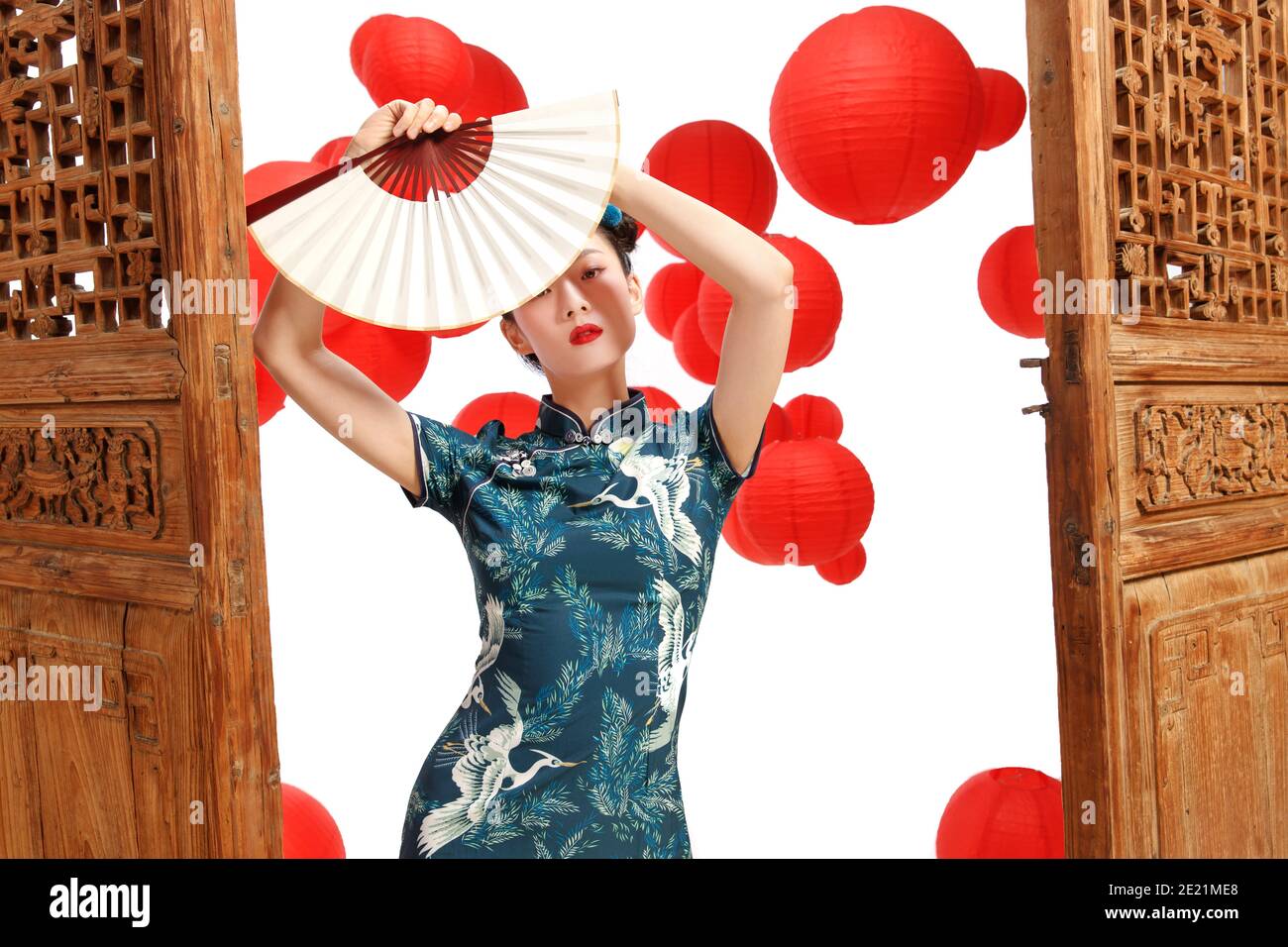 Beautiful woman with a fan Stock Photo - Alamy