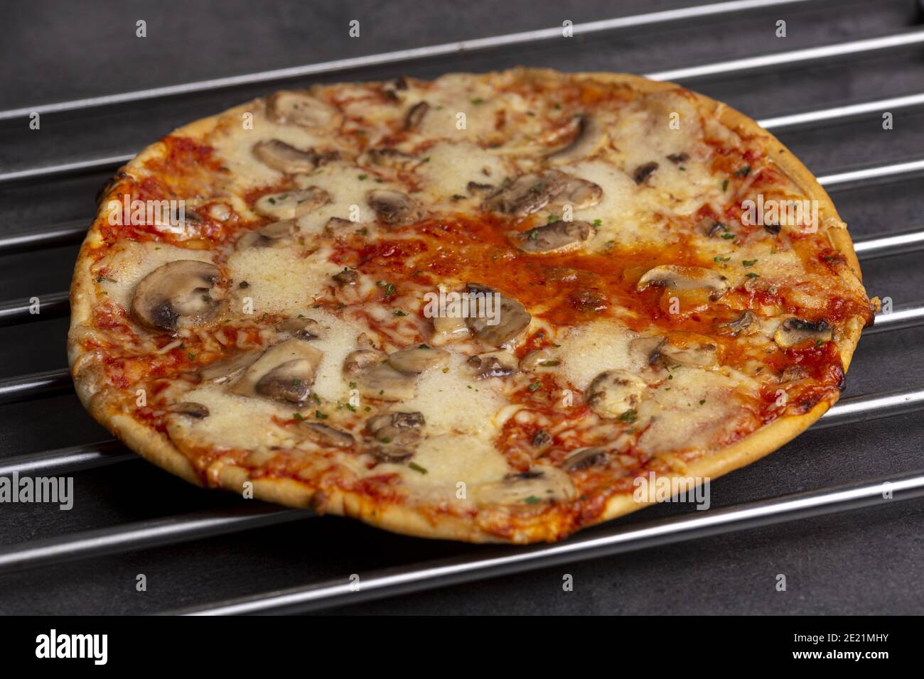 Rustic modern gray kitchen with tasty colorful pizza Stock Photo - Alamy