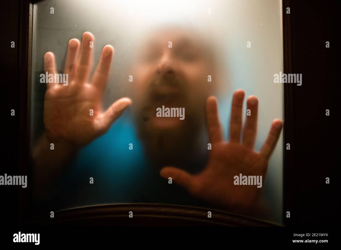 scary picture of hands behind glass Stock Photo - Alamy